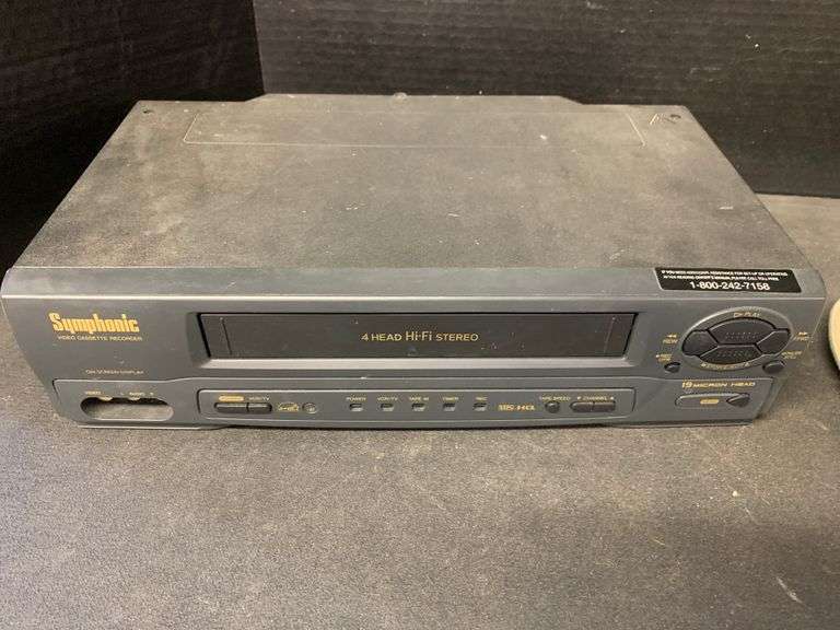 Assorted VHS Tapes and Symphonic VHS Player - Delaware Auction Center