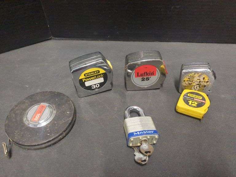 Assortment of Measuring Tapes and Padlock with Key - Delaware Auction ...