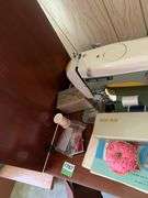 New Home Super Deluxe Sewing Machine w/ Stand - Delaware Auction Center