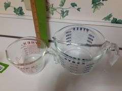 (2) Pyrex Measuring Cups - Delaware Auction Center