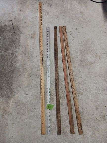 (4) Vintage Wood Yard Sticks & Aluminum Ruler - Delaware Auction Center