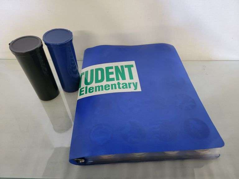 Binder and (2) Containers of Pogs - Delaware Auction Center