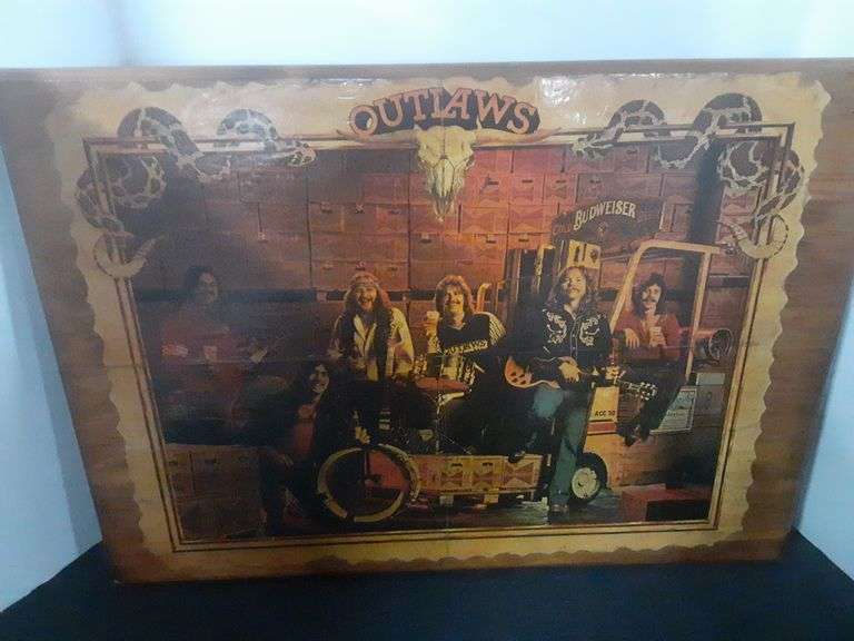 Outlaws Poster on Board - Delaware Auction Center
