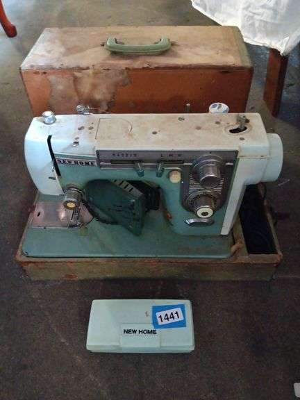 Vintage New Home Sewing Machine - Delaware Auction Center