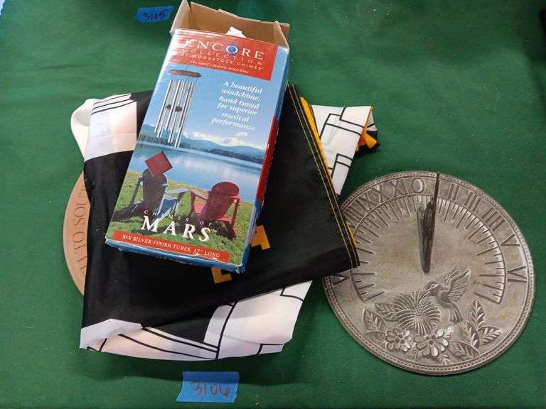 Garden Flags, Sun Dial, Compass & Wind Chimes - Delaware Auction Center