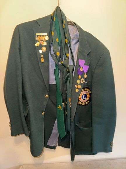 Lions jacket with pins and ties • Hallway closet - Duck Soup Auctions