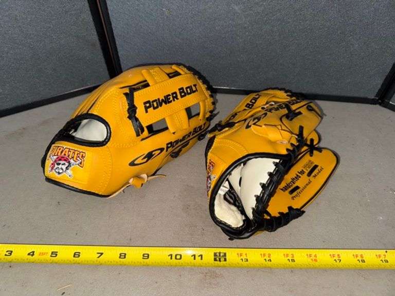 Power bolt pirates baseball gloves • Great room - Duck Soup Auctions