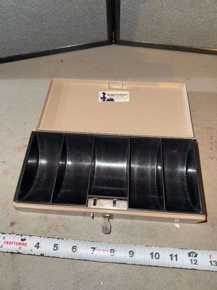Change box with key • Basement with walk out - Duck Soup Auctions