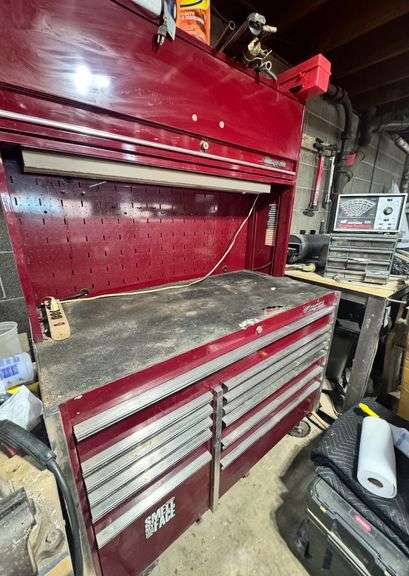 Snap on tool box with workbench Main section measures 52" wide x 26 ...