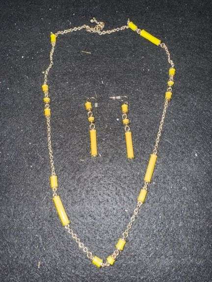 Women’s necklace and earrings set marked LC • Living room - Duck Soup ...