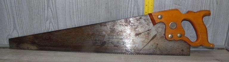 Two Hand Saws & Machete' - Dunker Auction