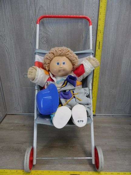 Cabbage Patch Kid With Stoller & Baseball Outfit - Dunker Auction