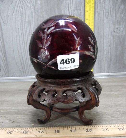 Cranberry Glass Paperweight with Wood Stand - Dunker Auction