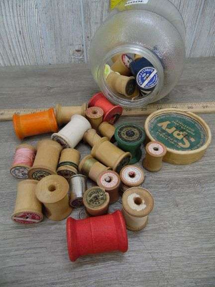 Glass Jar With Wood Thread Spools - Dunker Auction