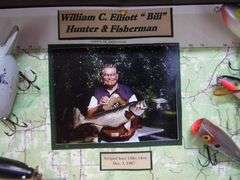 Fishing Lure Shadow Box With Newspaper Clippings - Dunker Auction