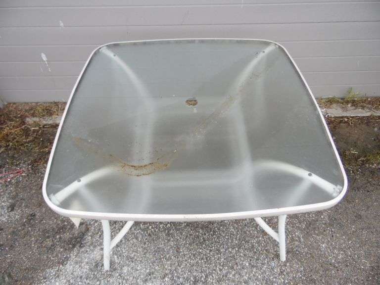 Glass Top Patio Table - Dunker Auction
