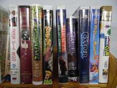 VCR Storage Shelf With Various VCR Tapes - 22 1/2" x 8" x 46 1/2 ...