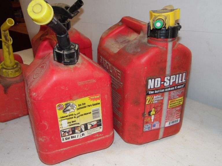 Four Red Gas Cans - Dunker Auction