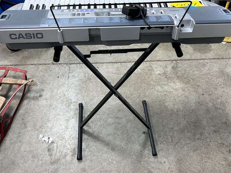 CASIO LK-100 KEYBOARD W/ STAND - Earl's Auction Company