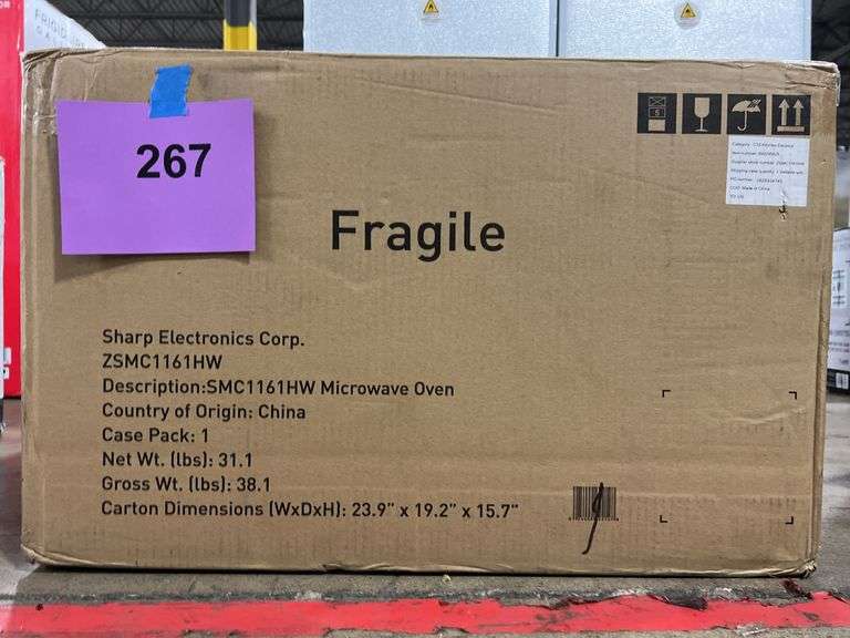 SHARP ELECTRONICS MICROWAVE OVEN IN BOX - Earl's Auction Company