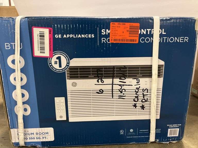 GE ROOM AIR CONDITIONER IN BOX - Earl's Auction Company