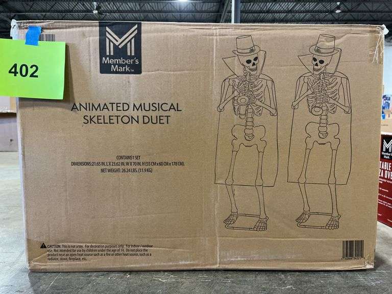 ANIMATED MUSICAL SKELETON DUET IN BOX - Earl's Auction Company