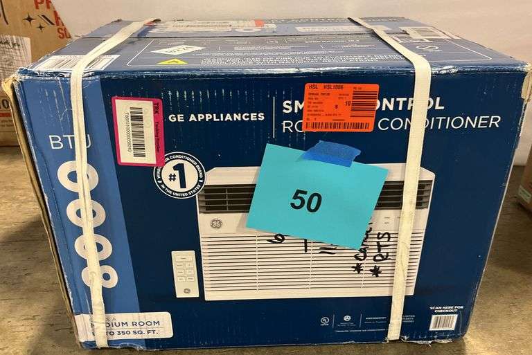 GE ROOM AIR CONDITIONER IN BOX - Earl's Auction Company