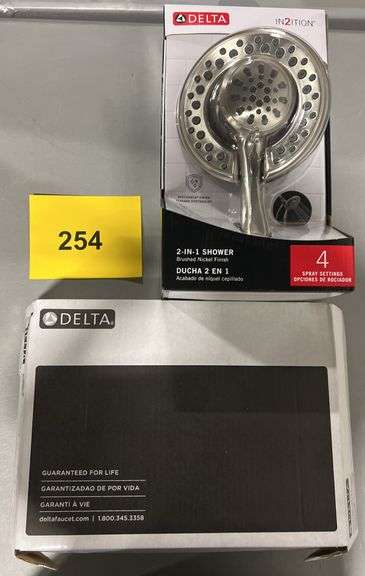 DELTA SHOWER HEAD & TWO HANDLE FAUCET IN BOXES - Earl's Auction Company