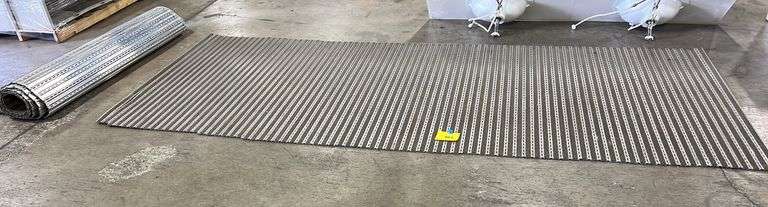 (2) ROLLS OF INTERLOCKING TRACTION RAMP FLOORING - Earl's Auction Company