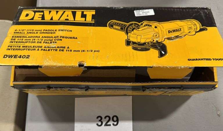DEWALT 4-1/2" PADDLE SWITCH SMALL ANGLE GRINDER IN BOX - Earl's Auction Company