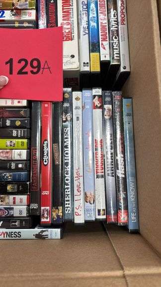 APPROX 50 ASSORTED DVDS - Earl's Auction Company