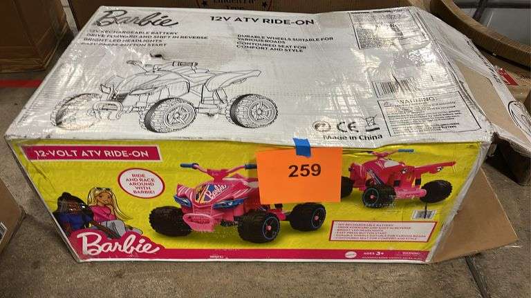 KIDS BARBIE 12V ATV RIDE ON IN BOX - Earl's Auction Company