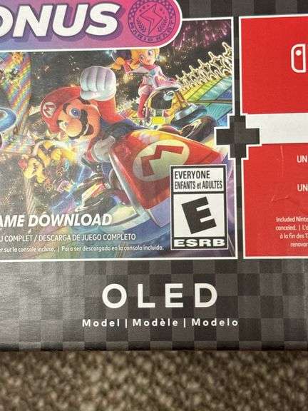 NEW NINTENDO SWITCH OLED IN BOX - Earl's Auction Company