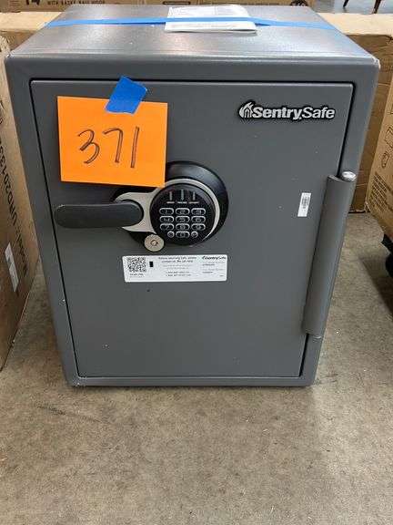 GREY SENTRYSAFE FIRE SAFE W/ DIGITAL PIN PAD - Earl's Auction Company