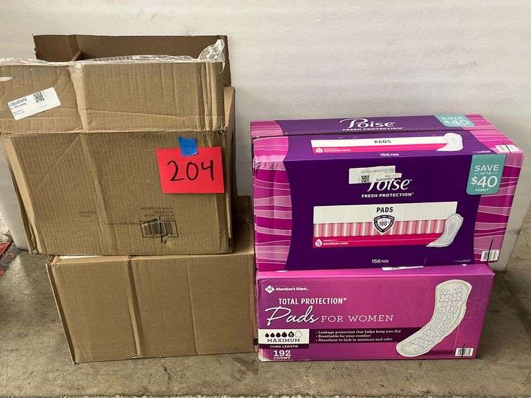 (4) BOXES OF ASSORTED PADS FOR WOMEN - SEE PHOTOS - Earl's Auction Company