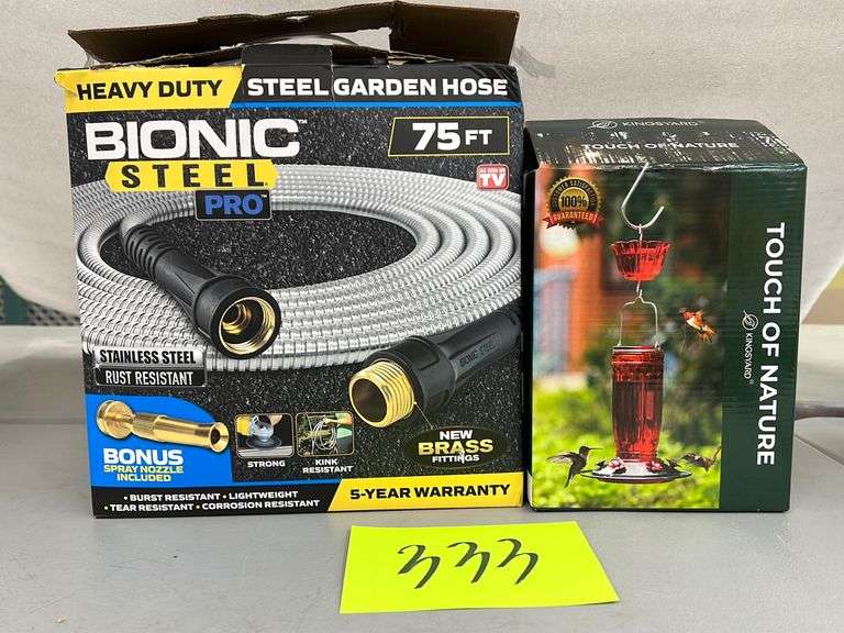 2PC OUTDOOR LOT - GARDEN HOSE & HUMMINGBIRD FEEDER - Earl's Auction Company