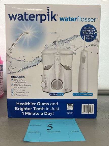 NEW WATERPIK WATERFLOSSER IN BOX - Earl's Auction Company