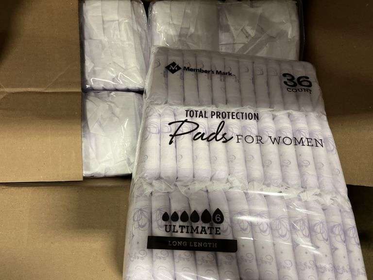 (11) PACKS OF WOMENS PADS & (2) BOXES - Earl's Auction Company