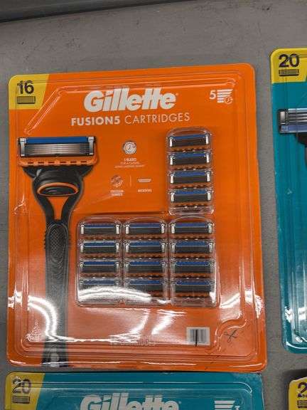 (4) PACKS OF GILLETTE RAZOR CATRIDGES - Earl's Auction Company