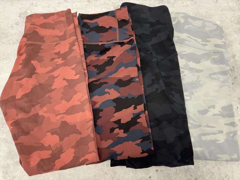 (4) PAIRS OF CAMO LULULEMON LEGGINGS SIZE 10 - Earl's Auction Company