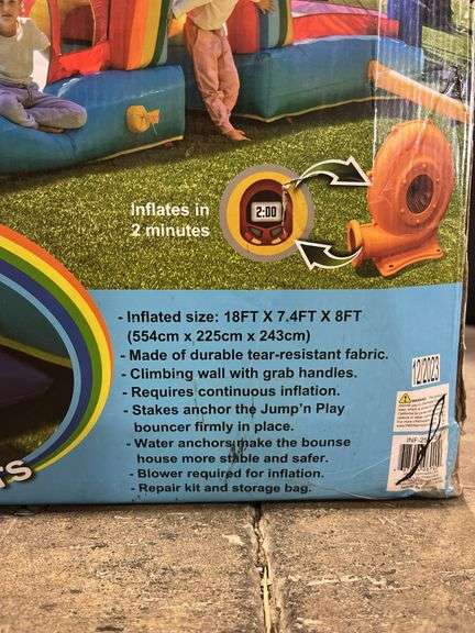 RAINBOW BOUNCE HOUSE IN BOX - Earl's Auction Company