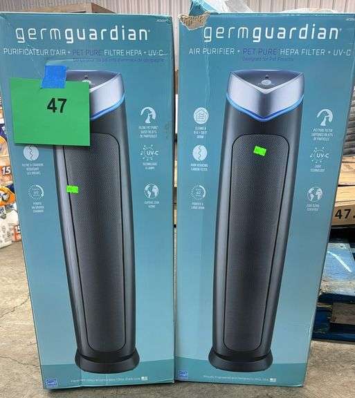 (2) GERM GUARDIAN AIR PURIFIERS IN BOXES - Earl's Auction Company