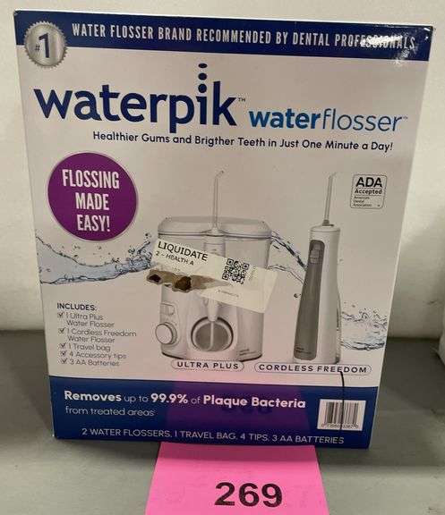 WATERPIK WATER FLOSSER IN BOX - Earl's Auction Company