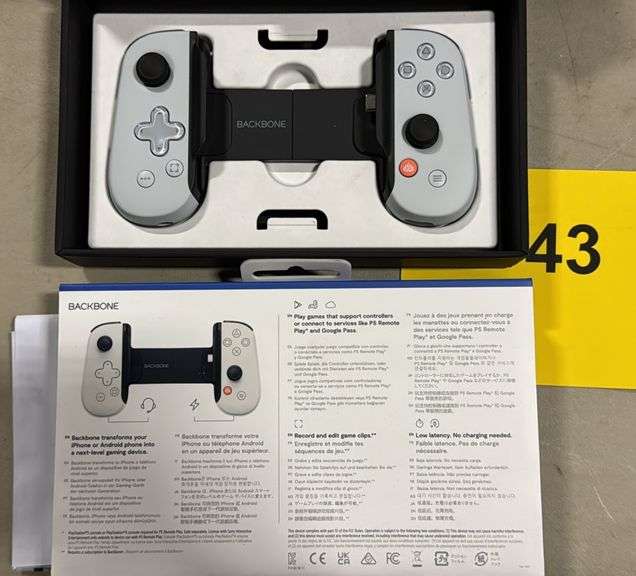 PLAYSTATION BACKBONE W/ BOX - Earl's Auction Company