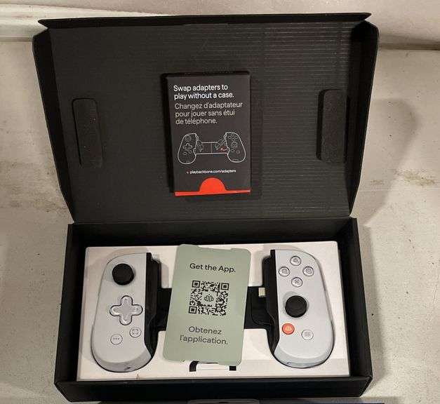 PLAYSTATION BACKBONE W/ BOX - Earl's Auction Company