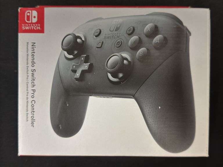 NINTENDO SWITCH PRO CONTROLLER IN BOX - Earl's Auction Company