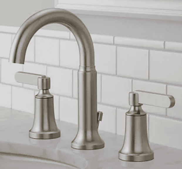 DELTA TWO HANDLE WIDESPREAD FAUCET IN BOX - Earl's Auction Company