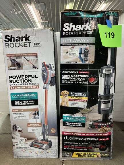AS IS - (2) SHARK VACUUMS IN BOXES - Earl's Auction Company
