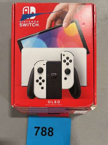NINTENDO SWITCH OLED IN BOX - Earl's Auction Company