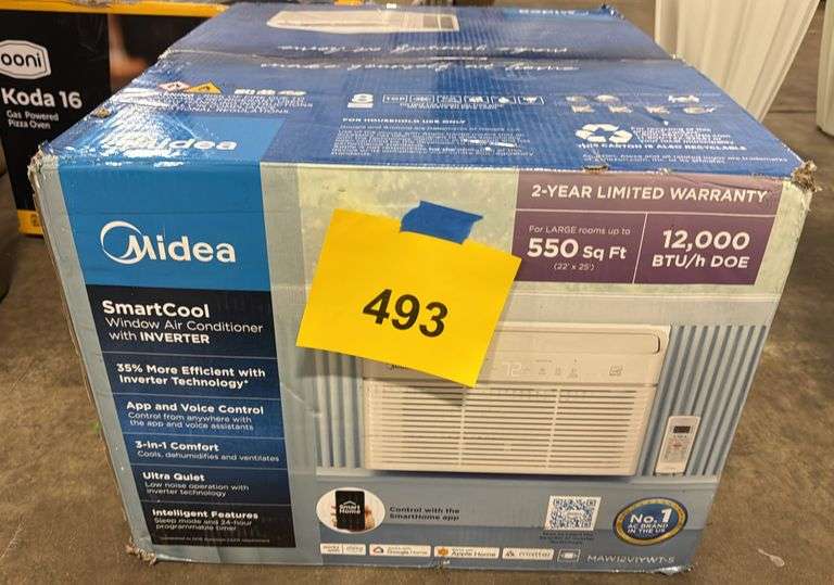 MIDEA WINDOW AIR CONDITIONER IN BOX - Earl's Auction Company